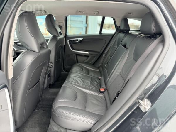 Grey Volvo V60 2013 in Riga, with an engine capacity of 2.00 L and mileage of 275 thousand km for 7595 €, photo 6 on AUTOMOTO.COM.LV