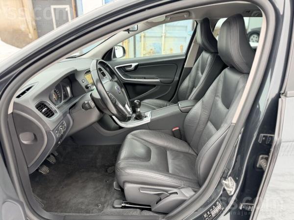 Grey Volvo V60 2013 in Riga, with an engine capacity of 2.00 L and mileage of 275 thousand km for 7595 €, photo 8 on AUTOMOTO.COM.LV