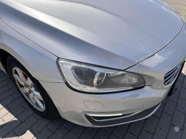 Grey Volvo V60 2013 in Marijampole, with an engine capacity of 1.56 L and mileage of 300 thousand km for 3600 €, photo 4 on AUTOMOTO.COM.LV