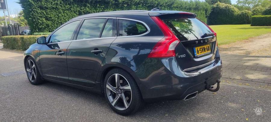 Grey Volvo V60 2013 in Kaunas, with an engine capacity of 2.40 L and mileage of 295 thousand km for 6200 €, photo 13 on AUTOMOTO.COM.LV
