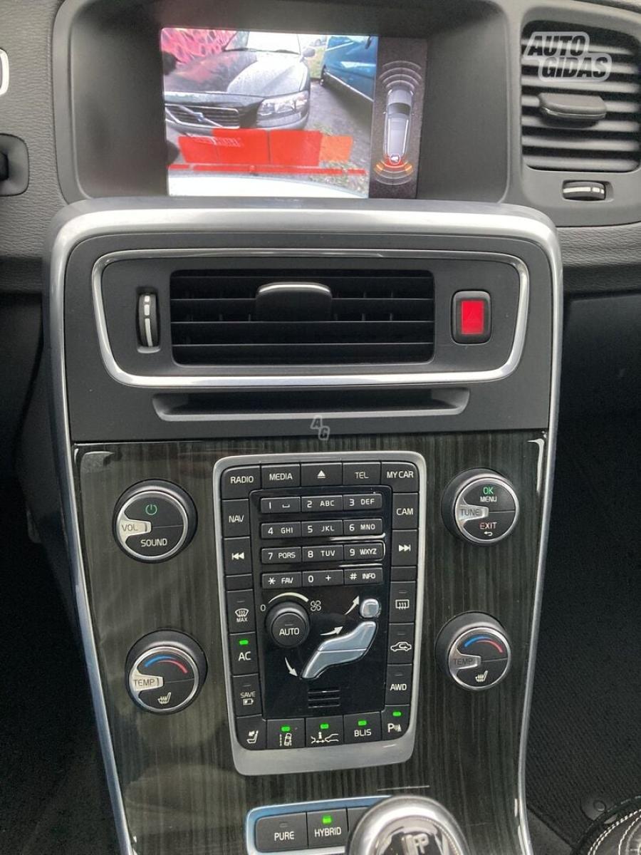 Grey Volvo V60 2013 in Vilnius, with an engine capacity of 2.40 L and mileage of 290 thousand km for 5849 €, photo 12 on AUTOMOTO.COM.LV