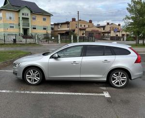 Pelēks Volvo V60 2013 Panevēža, ar dzinēja tilpumu 1.98 L un nobraukumu 291 tūkst. km par 6950 €, foto 5 vietnē AUTOMOTO.COM.LV