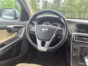 Grey Volvo V60 2013 in Utena, with an engine capacity of 2.00 L and mileage of 265 thousand km for 6490 €, photo 21 on AUTOMOTO.COM.LV