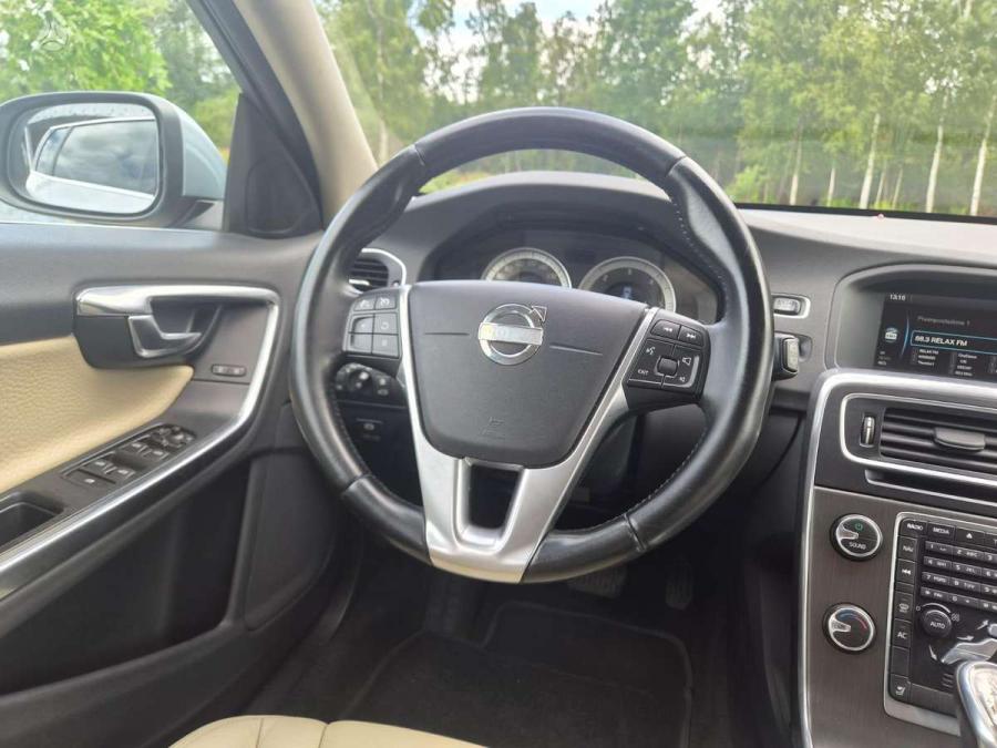 Grey Volvo V60 2013 in Utena, with an engine capacity of 2.00 L and mileage of 265 thousand km for 6490 €, photo 21 on AUTOMOTO.COM.LV