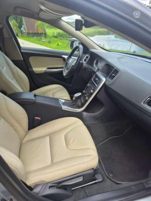 Grey Volvo V60 2013 in Utena, with an engine capacity of 2.00 L and mileage of 265 thousand km for 6490 €, photo 25 on AUTOMOTO.COM.LV