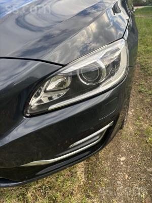 Pelēks Volvo V60 2013 Daugavpils, ar dzinēja tilpumu 2.40 L un nobraukumu 310 tūkst. km par 6500 €, foto 18 vietnē AUTOMOTO.COM.LV