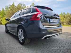 Grey Volvo V60 2014 in Tallinn, with an engine capacity of 2.40 L and mileage of 298 thousand km for 8900 €, photo 4 on AUTOMOTO.COM.LV
