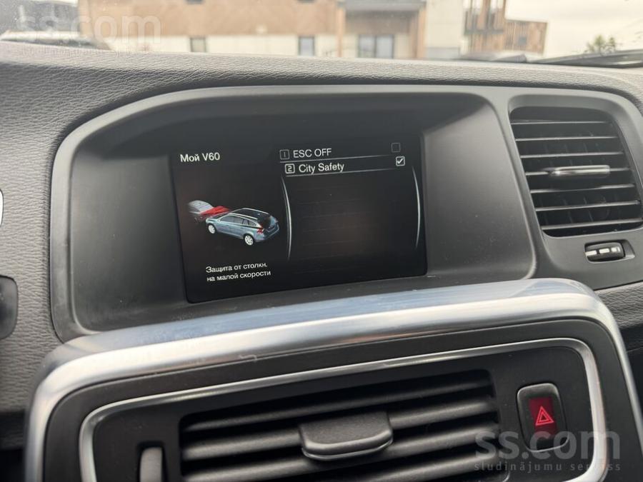 Pelēks Volvo V60 2014 Rīga, ar dzinēja tilpumu 2.00 L un nobraukumu 330 tūkst. km par 7800 €, foto 12 vietnē AUTOMOTO.COM.LV