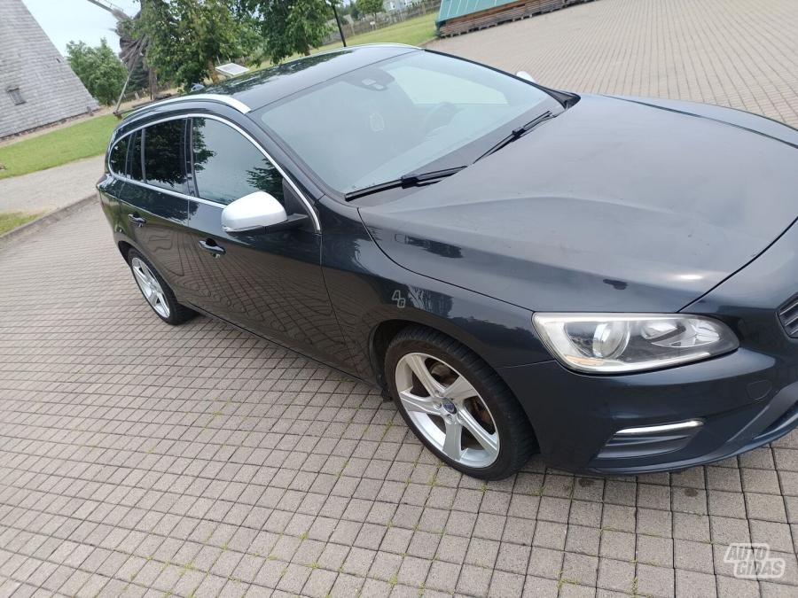 Grey Volvo V60 2014 in Siauliai, with an engine capacity of 2.00 L and mileage of 295 thousand km for 6750 €, photo 11 on AUTOMOTO.COM.LV