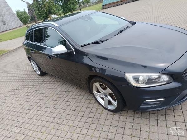 Pelēks Volvo V60 2014 Šauļi, ar dzinēja tilpumu 2.00 L un nobraukumu 295 tūkst. km par 6750 €, foto 10 vietnē AUTOMOTO.COM.LV
