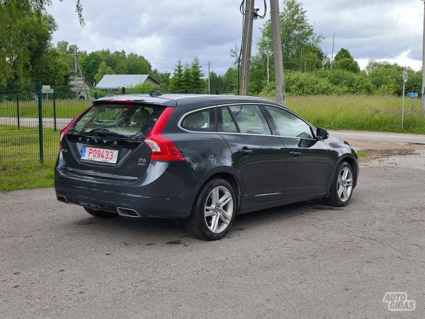 Grey Volvo V60 2014 in Vilnius, with an engine capacity of 2.40 L and mileage of 298 thousand km for 7300 €, photo 4 on AUTOMOTO.COM.LV