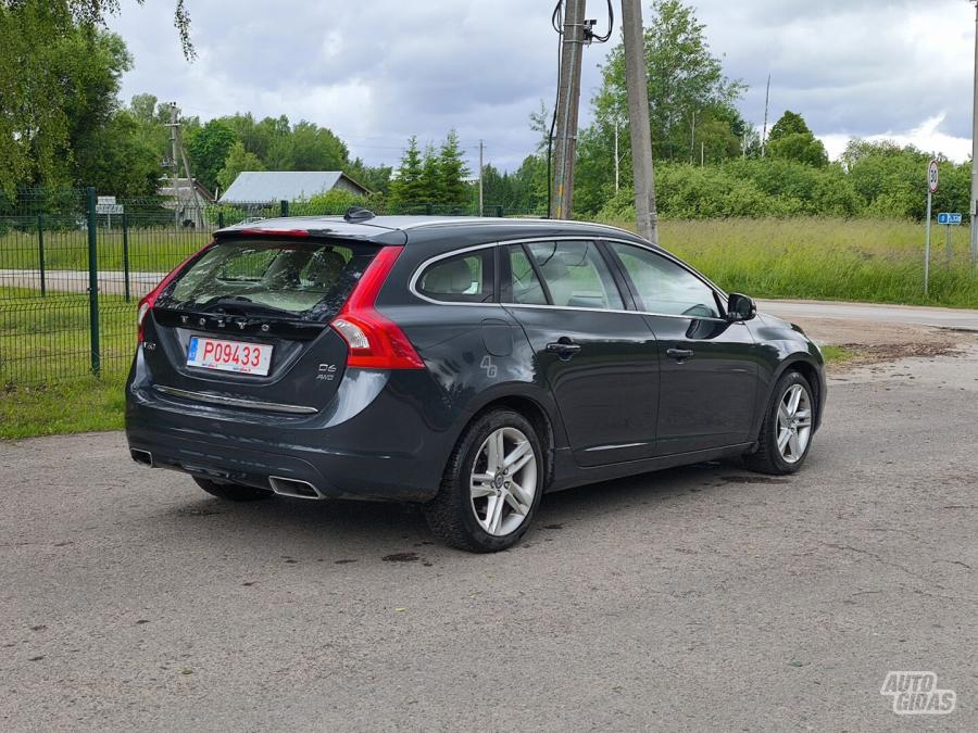 Grey Volvo V60 2014 in Vilnius, with an engine capacity of 2.40 L and mileage of 298 thousand km for 7300 €, photo 5 on AUTOMOTO.COM.LV