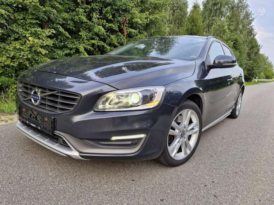 Grey Volvo V60 2014 in Vilnius, with an engine capacity of 2.40 L and mileage of 242 thousand km for 8900 €, photo 1 on AUTOMOTO.COM.LV
