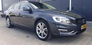 Grey Volvo V60 2014 in Prienai, with an engine capacity of 2.40 L and mileage of 152 thousand km for 8450 €, photo 1 on AUTOMOTO.COM.LV