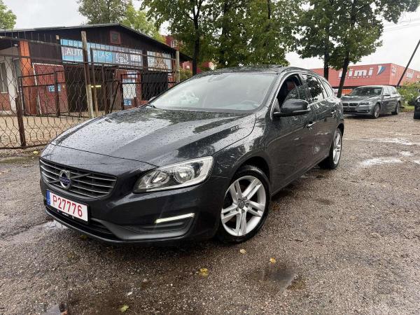 Grey Volvo V60 2014 in Ukmerge, with an engine capacity of 2.00 L and mileage of 300 thousand km for 5850 €, photo 1 on AUTOMOTO.COM.LV