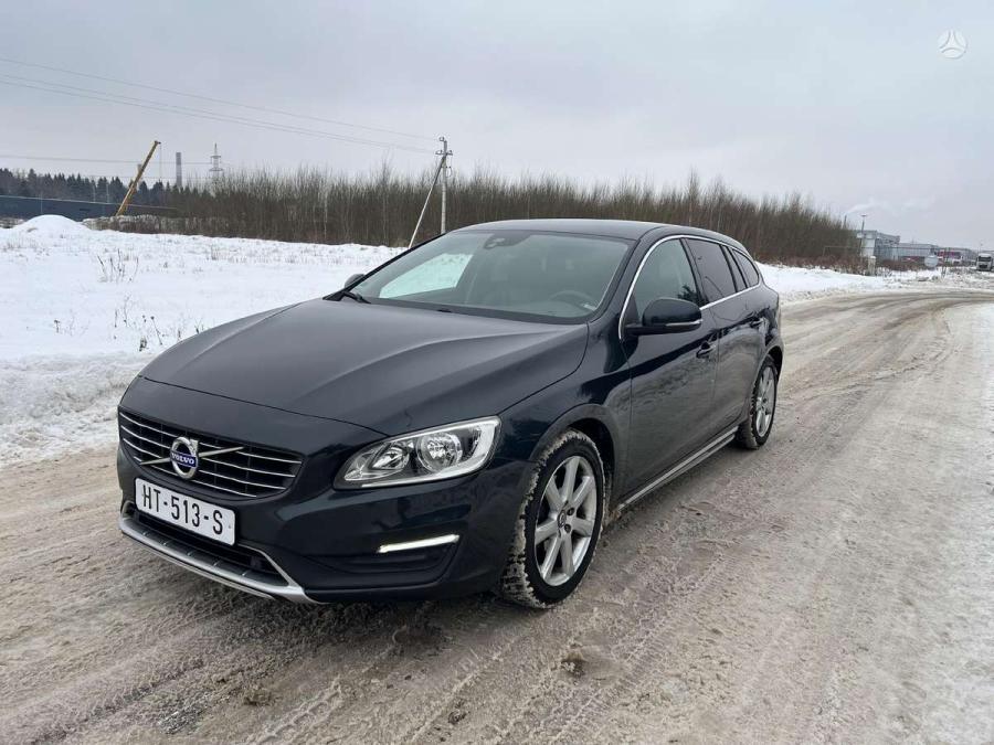 Grey Volvo V60 2015 in Kaunas, with an engine capacity of 1.98 L and mileage of 273 thousand km for 6950 €, photo 4 on AUTOMOTO.COM.LV
