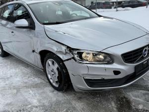 Grey Volvo V60 2015 in Raseiniai, with an engine capacity of 1.97 L and mileage of 223 thousand km for 4350 €, photo 6 on AUTOMOTO.COM.LV