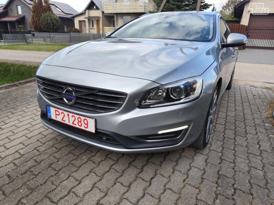 Grey Volvo V60 2015 in Marijampole, with an engine capacity of 2.40 L and mileage of 218 thousand km for 8900 €, photo 3 on AUTOMOTO.COM.LV