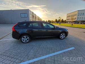 Grey Volvo V60 2015 in Riga, with an engine capacity of 2.00 L and mileage of 223 thousand km for 6200 €, photo  on AUTOMOTO.COM.LV