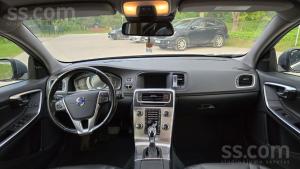 Grey Volvo V60 2015 in Jurmala, with an engine capacity of 2.00 L and mileage of 0 thousand km for 7950 €, photo 13 on AUTOMOTO.COM.LV