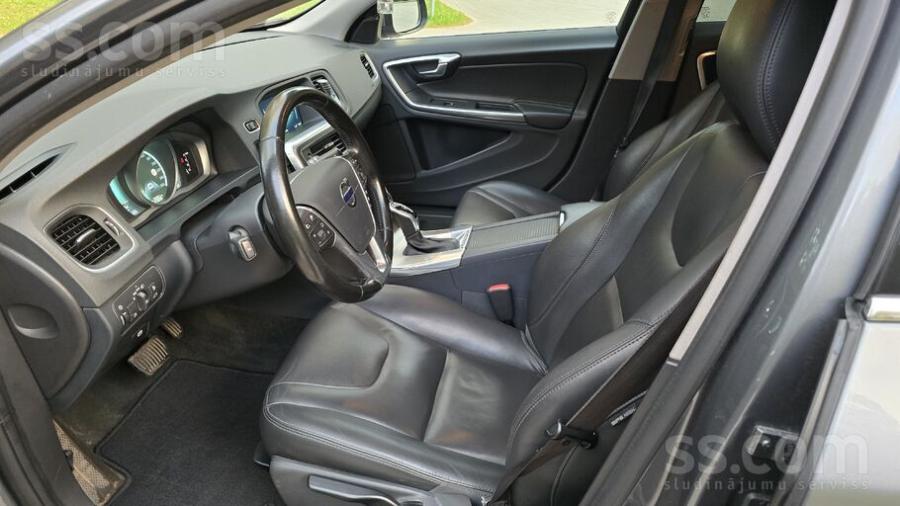 Grey Volvo V60 2015 in Jurmala, with an engine capacity of 2.00 L and mileage of 0 thousand km for 7950 €, photo 18 on AUTOMOTO.COM.LV