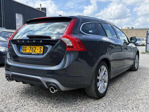 Grey Volvo V60 2015 in Kaunas, with an engine capacity of 1.97 L and mileage of 234 thousand km for 6699 €, photo 4 on AUTOMOTO.COM.LV