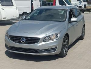 Grey Volvo V60 2015 in Taurage, with an engine capacity of 2.00 L and mileage of 240 thousand km for 6200 €, photo  on AUTOMOTO.COM.LV