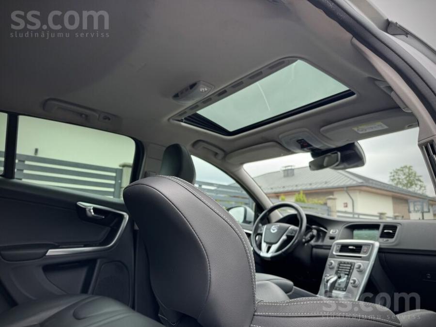 Pelēks Volvo V60 2016 Jelgava, ar dzinēja tilpumu 2.40 L un nobraukumu 217 tūkst. km par 9800 €, foto 18 vietnē AUTOMOTO.COM.LV
