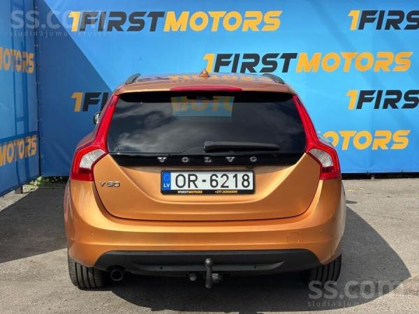 Orange Volvo V60 2011 in Riga, with an engine capacity of 2.00 L and mileage of 240 thousand km for 5950 €, photo 4 on AUTOMOTO.COM.LV