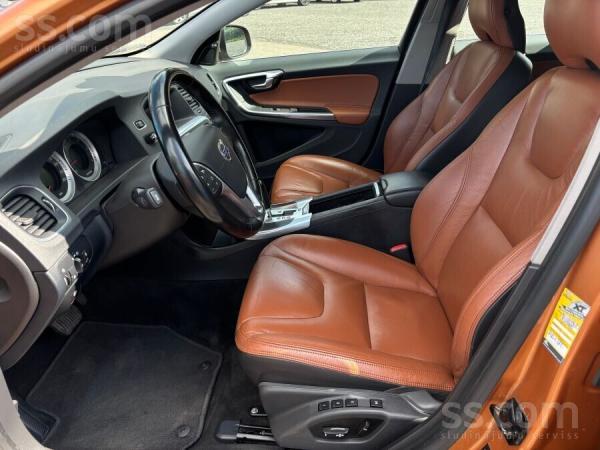Orange Volvo V60 2011 in Riga, with an engine capacity of 2.00 L and mileage of 240 thousand km for 5950 €, photo 8 on AUTOMOTO.COM.LV