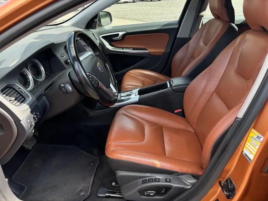 Orange Volvo V60 2011 in Riga, with an engine capacity of 2.00 L and mileage of 240 thousand km for 5950 €, photo 9 on AUTOMOTO.COM.LV