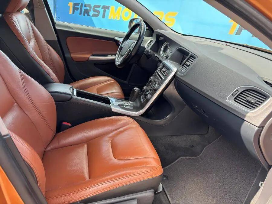 Orange Volvo V60 2011 in Riga, with an engine capacity of 2.00 L and mileage of 240 thousand km for 5950 €, photo 12 on AUTOMOTO.COM.LV