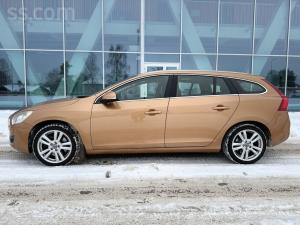 Orange Volvo V60 2012 in Rezekne, with an engine capacity of 2.40 L and mileage of 288 thousand km for 7700 €, photo 4 on AUTOMOTO.COM.LV