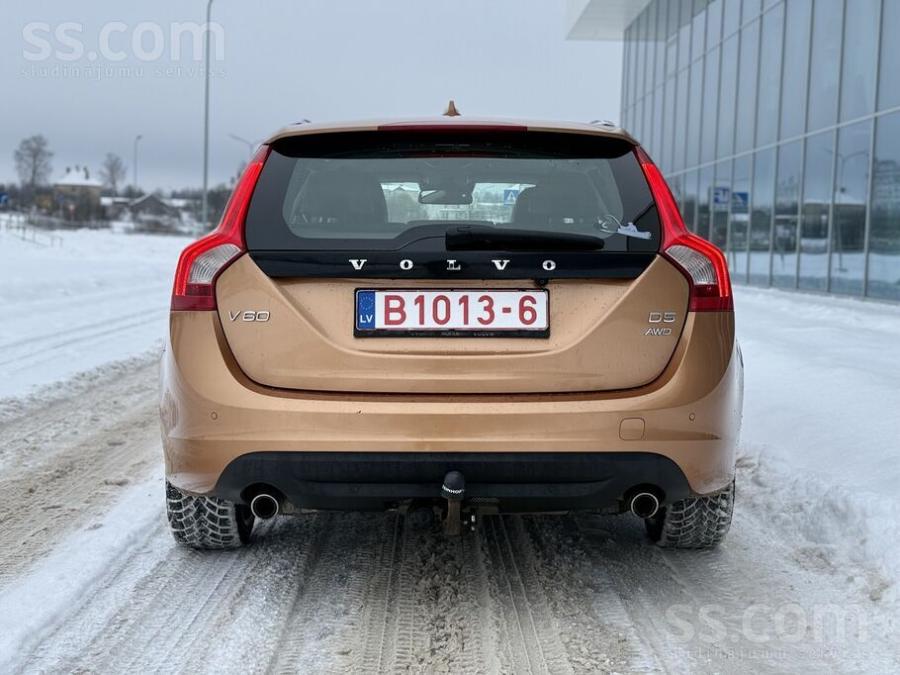 Orange Volvo V60 2012 in Rezekne, with an engine capacity of 2.40 L and mileage of 288 thousand km for 7700 €, photo 7 on AUTOMOTO.COM.LV