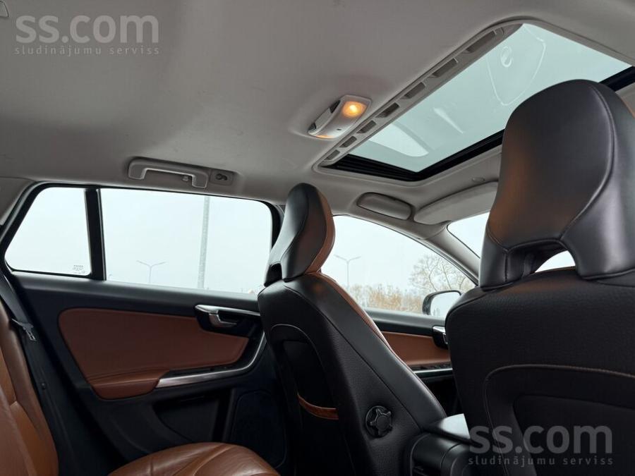 Orange Volvo V60 2012 in Rezekne, with an engine capacity of 2.40 L and mileage of 288 thousand km for 7700 €, photo 15 on AUTOMOTO.COM.LV