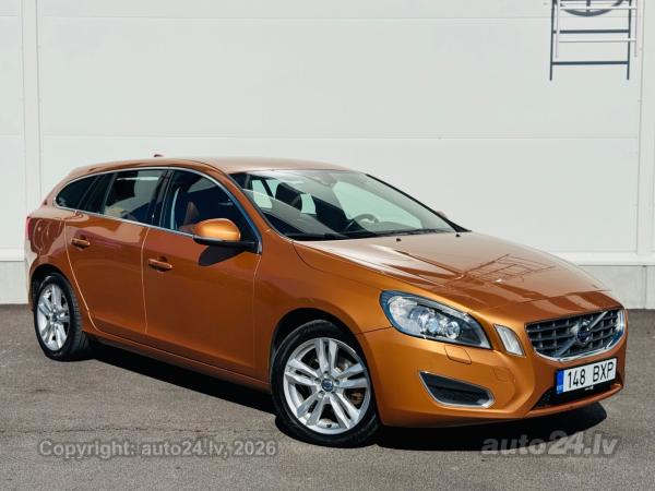 Orange Volvo V60 2012 in Tallinn, with an engine capacity of 2.00 L and mileage of 318 thousand km for 6390 €, photo 1 on AUTOMOTO.COM.LV