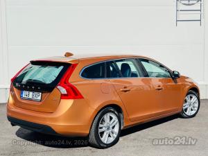 Orange Volvo V60 2012 in Tallinn, with an engine capacity of 2.00 L and mileage of 318 thousand km for 6390 €, photo 6 on AUTOMOTO.COM.LV