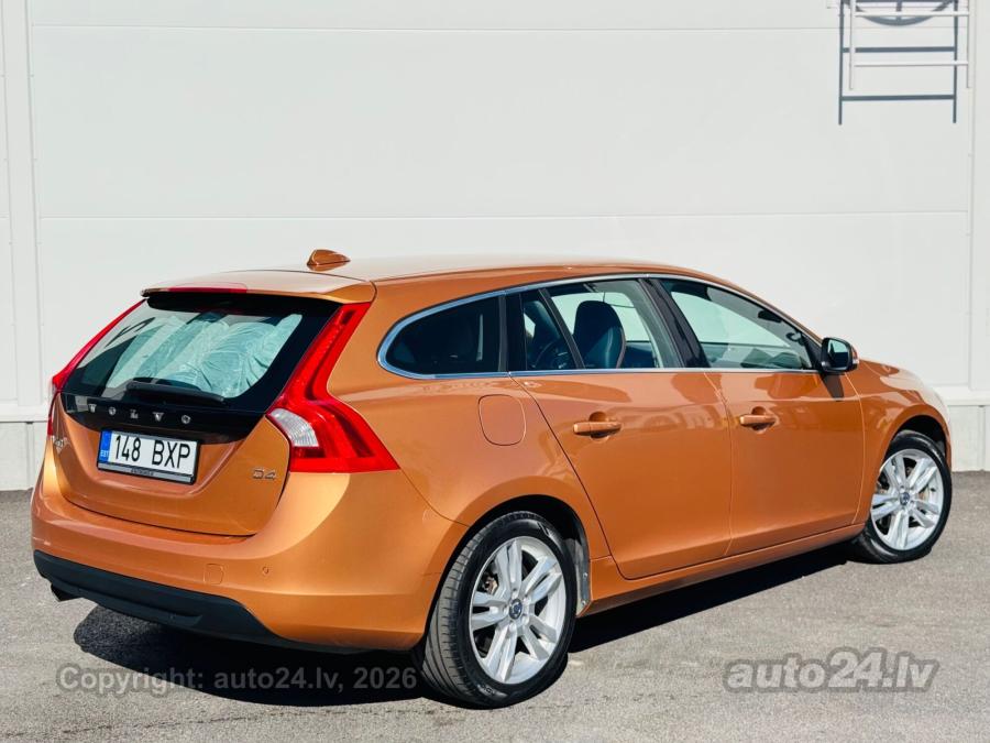 Orange Volvo V60 2012 in Tallinn, with an engine capacity of 2.00 L and mileage of 318 thousand km for 6390 €, photo 6 on AUTOMOTO.COM.LV