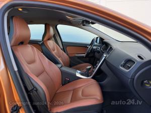 Orange Volvo V60 2012 in Tallinn, with an engine capacity of 2.00 L and mileage of 318 thousand km for 6390 €, photo 12 on AUTOMOTO.COM.LV