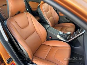 Orange Volvo V60 2012 in Tallinn, with an engine capacity of 2.00 L and mileage of 318 thousand km for 6390 €, photo 13 on AUTOMOTO.COM.LV