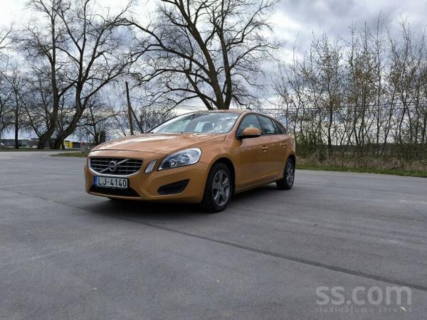 Orange Volvo V60 2012 in Riga, with an engine capacity of 2.00 L and mileage of 254 thousand km for 5500 €, photo 1 on AUTOMOTO.COM.LV