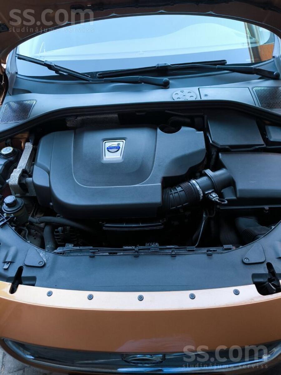 Orange Volvo V60 2012 in Riga, with an engine capacity of 2.00 L and mileage of 254 thousand km for 5500 €, photo 14 on AUTOMOTO.COM.LV