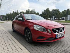 Red Volvo V60 2012 in Liepaja, with an engine capacity of 2.40 L and mileage of 473 thousand km for 6200 €, photo 4 on AUTOMOTO.COM.LV