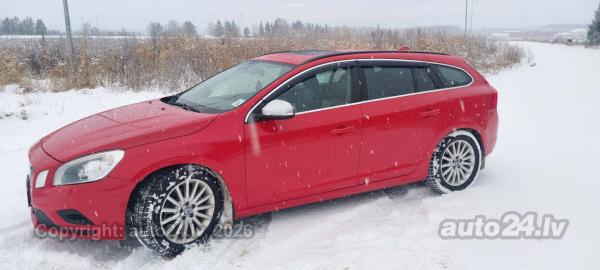 Sarkans Volvo V60 2013 Tartu, ar dzinēja tilpumu 2.40 L un nobraukumu 283 tūkst. km par 9500 €, foto 6 vietnē AUTOMOTO.COM.LV