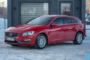 Red Volvo V60 2013 in Liepaja, with an engine capacity of 1.60 L and mileage of 290 thousand km for 6950 €, photo  on AUTOMOTO.COM.LV