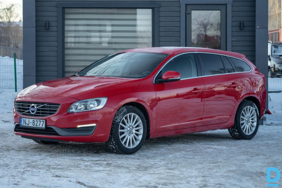 Red Volvo V60 2013 in Liepaja, with an engine capacity of 1.60 L and mileage of 290 thousand km for 6950 €, photo 1 on AUTOMOTO.COM.LV