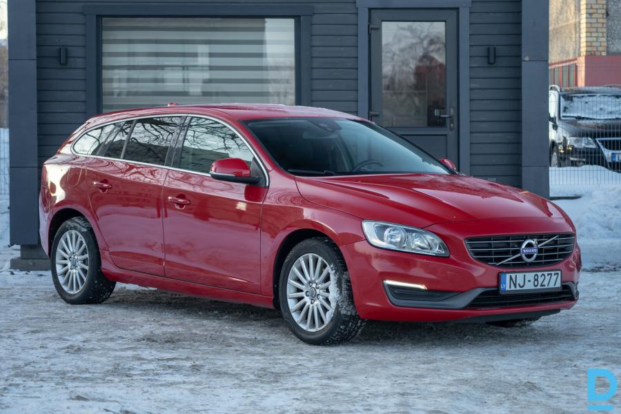 Red Volvo V60 2013 in Liepaja, with an engine capacity of 1.60 L and mileage of 290 thousand km for 6950 €, photo 4 on AUTOMOTO.COM.LV