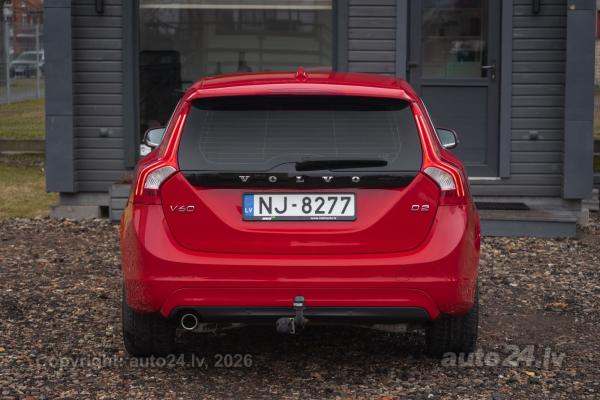 Red Volvo V60 2013 in Riga, with an engine capacity of 1.60 L and mileage of 290 thousand km for 6950 €, photo 5 on AUTOMOTO.COM.LV