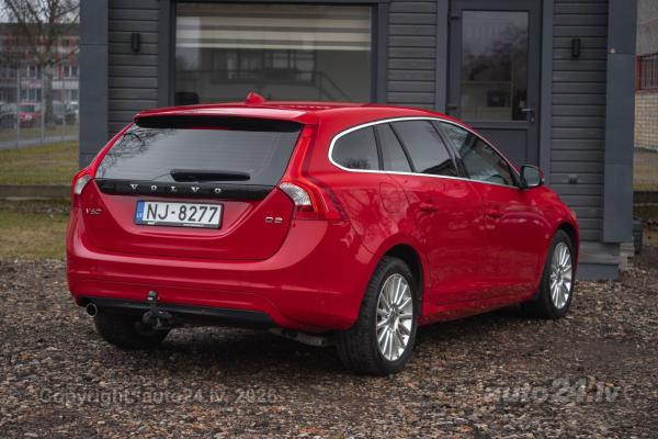 Red Volvo V60 2013 in Riga, with an engine capacity of 1.60 L and mileage of 290 thousand km for 6950 €, photo 6 on AUTOMOTO.COM.LV