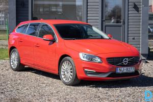 Red Volvo V60 2013 in Liepaja, with an engine capacity of 1.60 L and mileage of 290 thousand km for 6950 €, photo  on AUTOMOTO.COM.LV